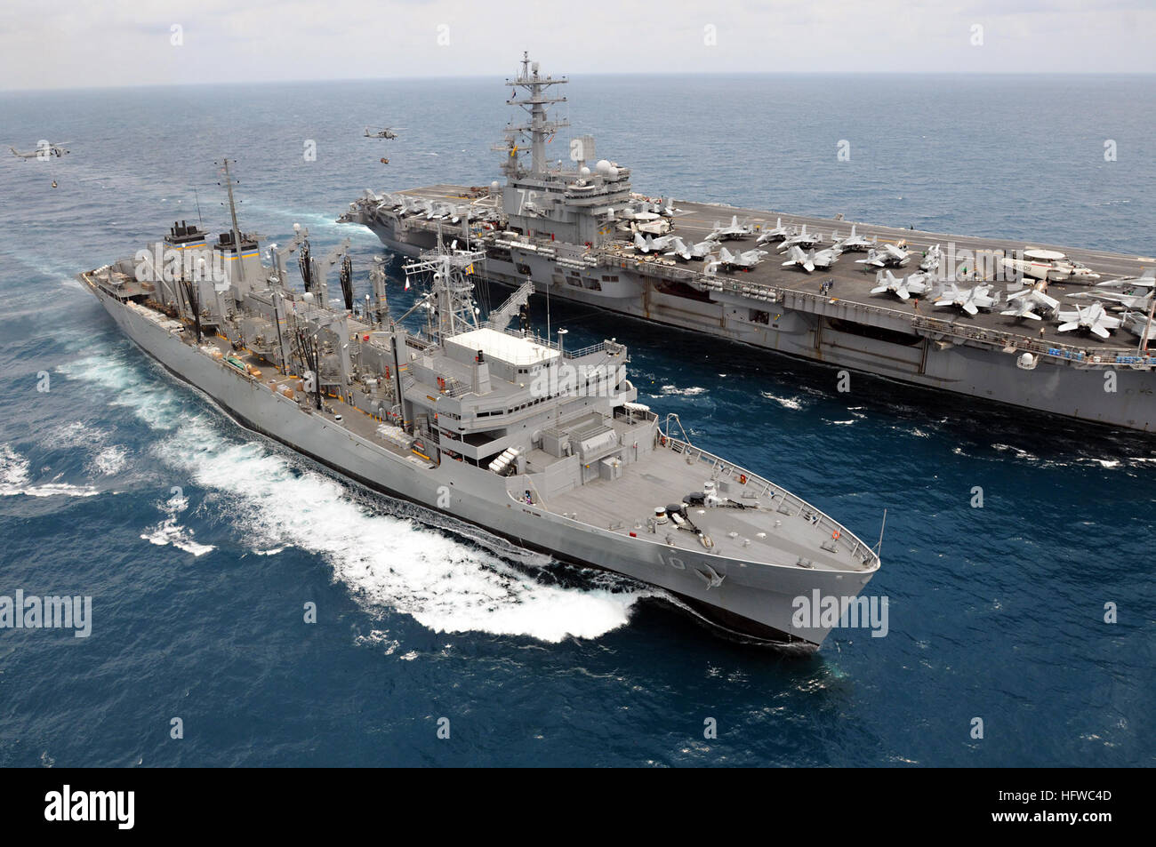 080815-N-5961C-004 PACIFIC OCEAN (Aug. 15, 2008) Two SH-60 Sea Hawk helicopters move pallets of ...