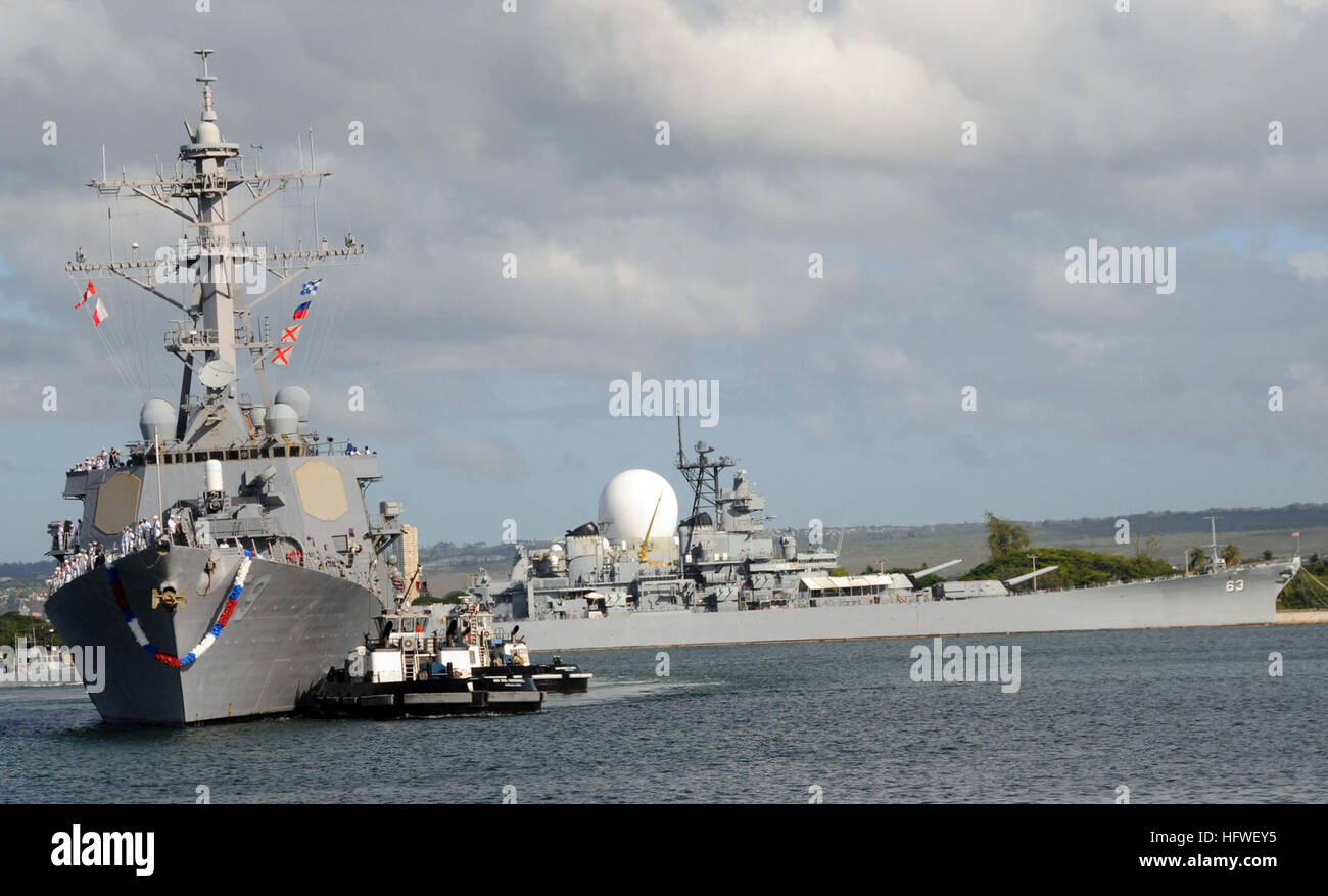 The Arleigh Burke-class guided-missile destroyer USS Russell passes the ...