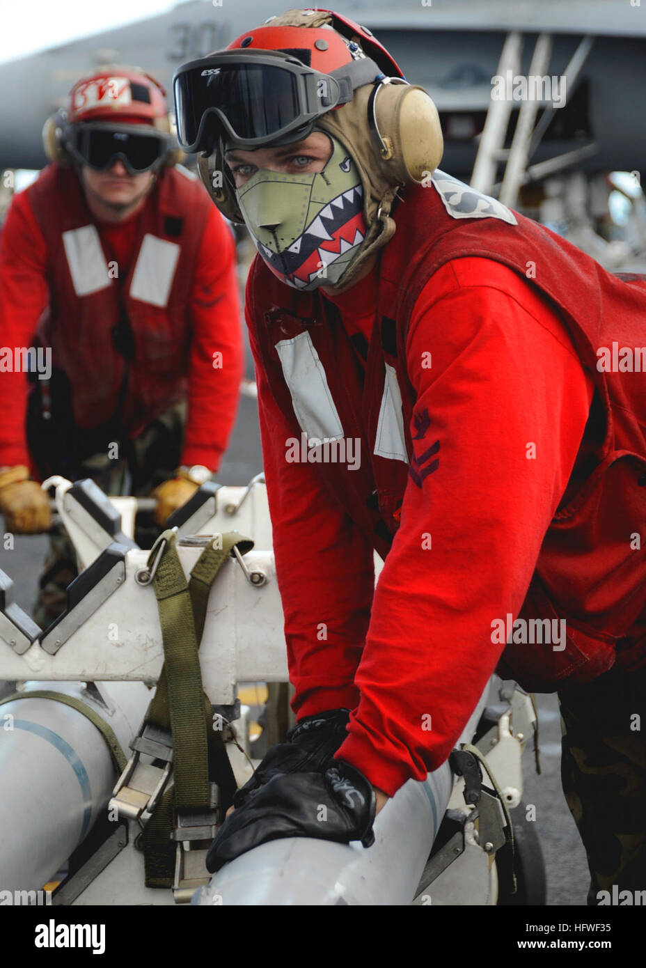 Aviation ordnanceman Petty Officer 2nd Class Charles Block transfers ...