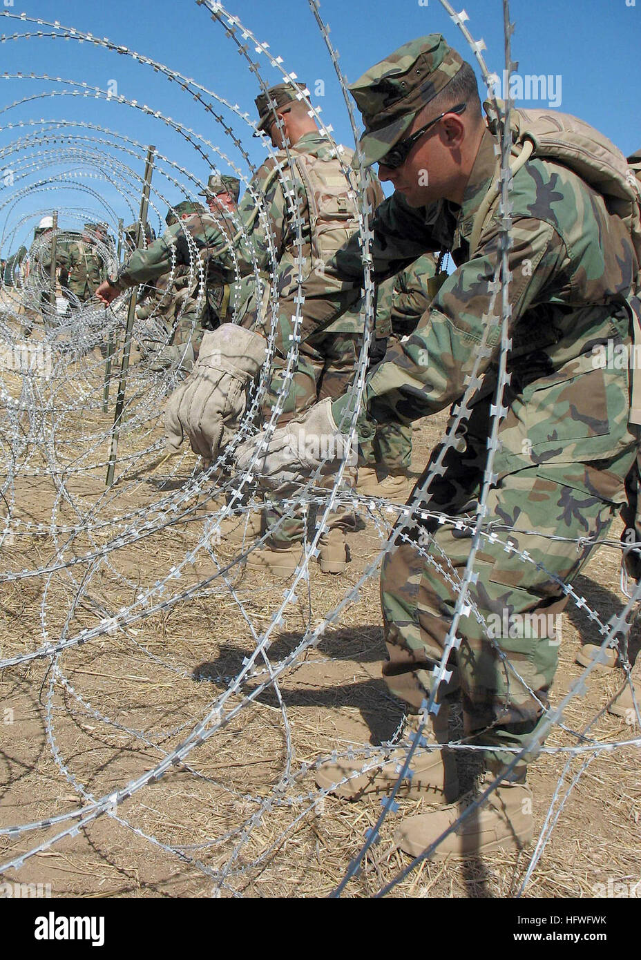 Triple strand concertina wire hi-res stock photography and images - Alamy
