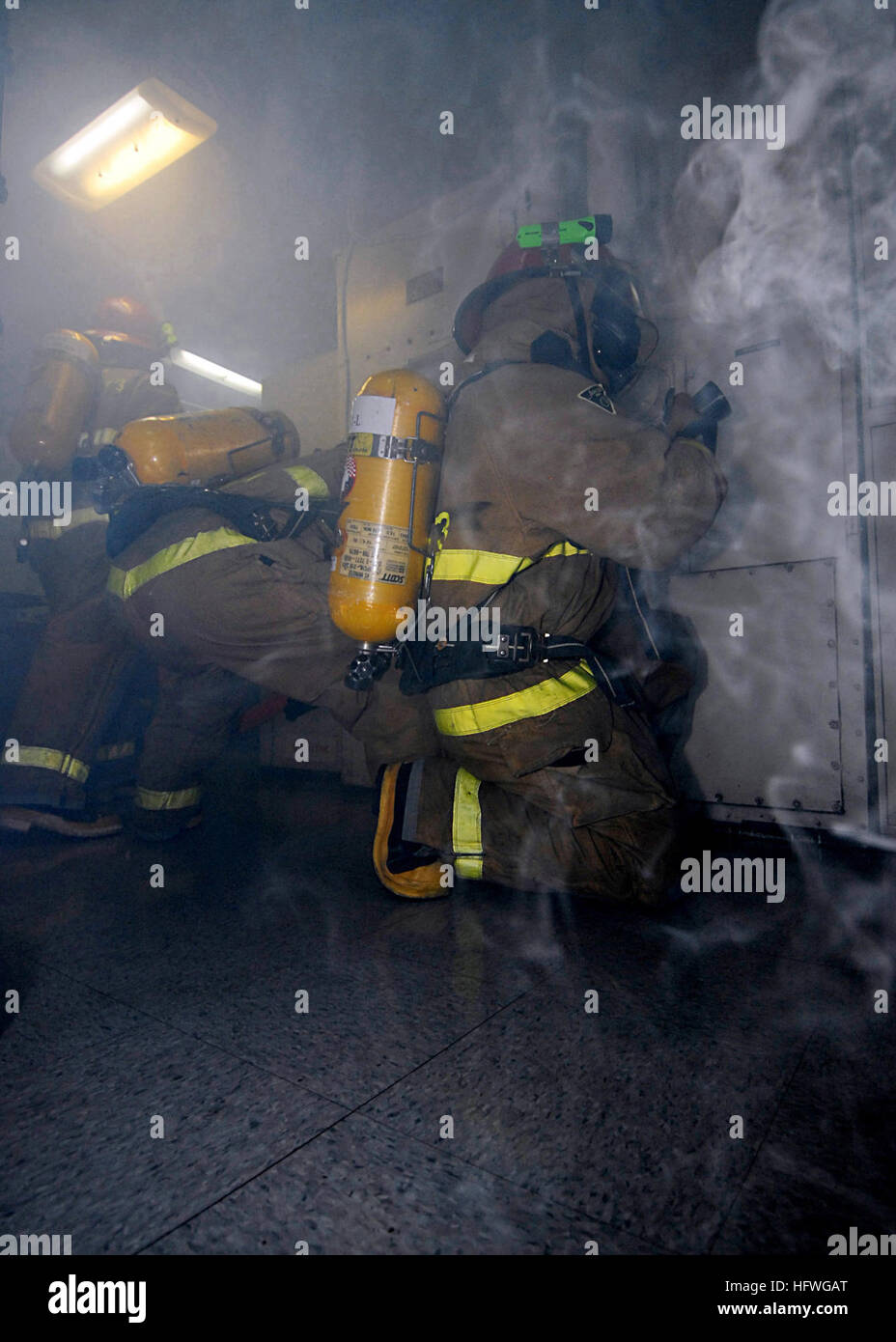 081024-N-1038M-037 PACIFIC OCEAN (Oct. 24, 2008) A hose team responds ...