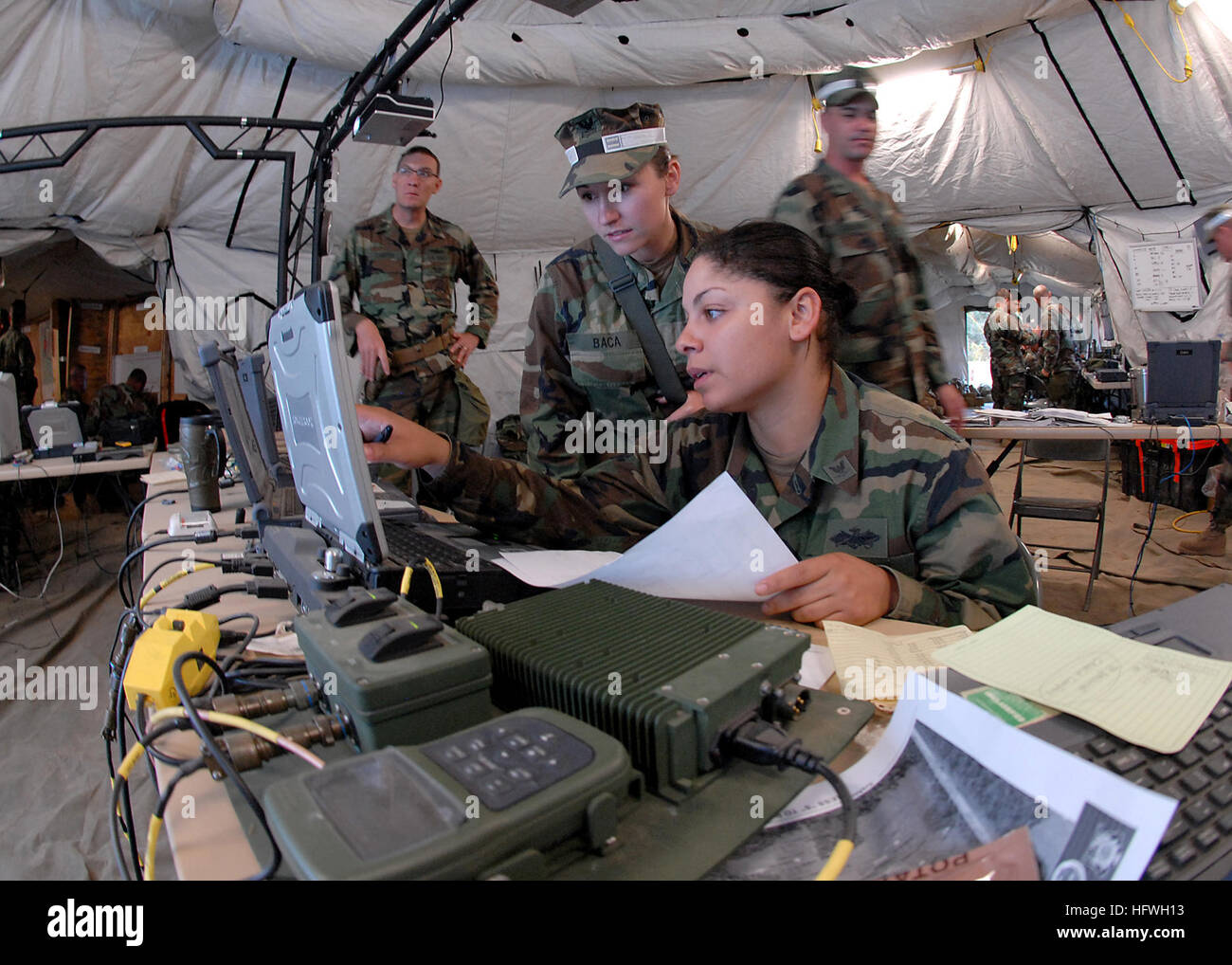 A Yeoman 3rd Class assigned to Naval Mobile Construction Battalion 1 ...