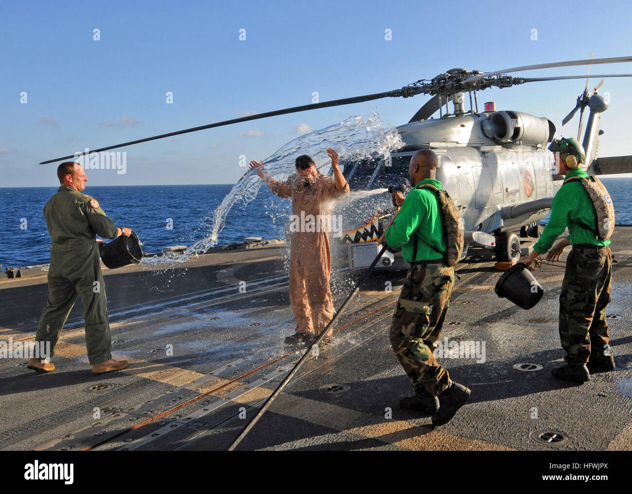 Sailors from Helicopter Anti-Submarine Squadron Light (HSL) 42 cool off ...