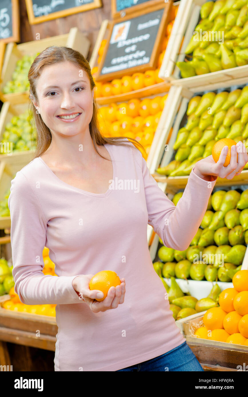 woman choosing fruit Stock Photo - Alamy