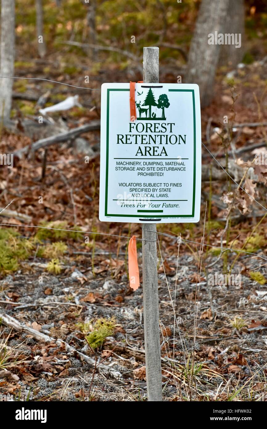 A forest retention area with a sign where building is prohibited Stock ...