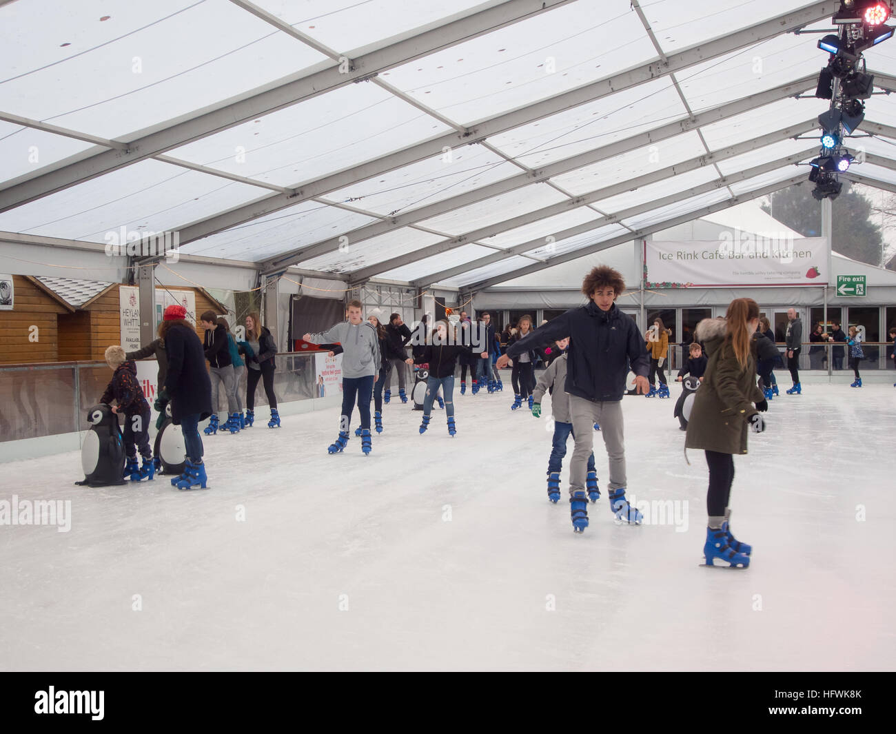 People Ice skating on the temporary Ice rink outside Winchester ...