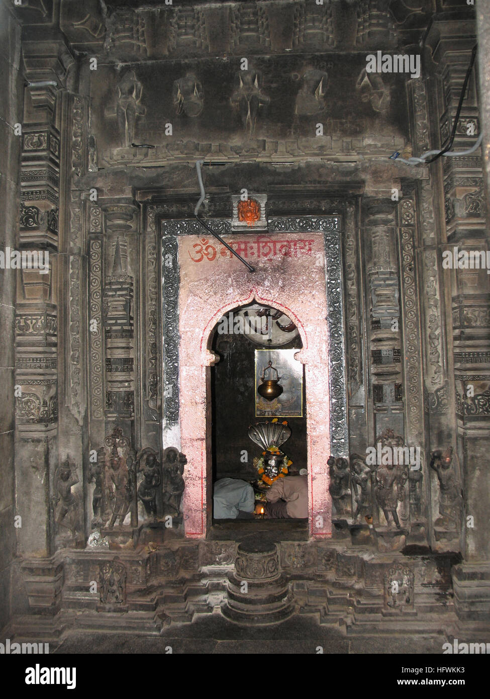 Linga Shrine with heavily carved doorway, Bhuleshwar temple Famous ...