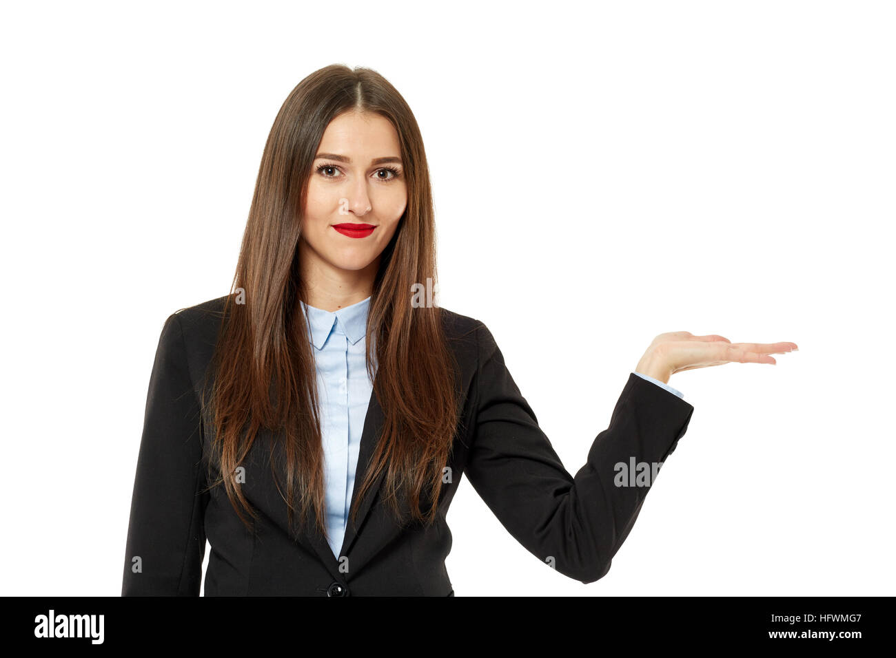Attractive businesswoman presenting an invisible product with copyspace ...