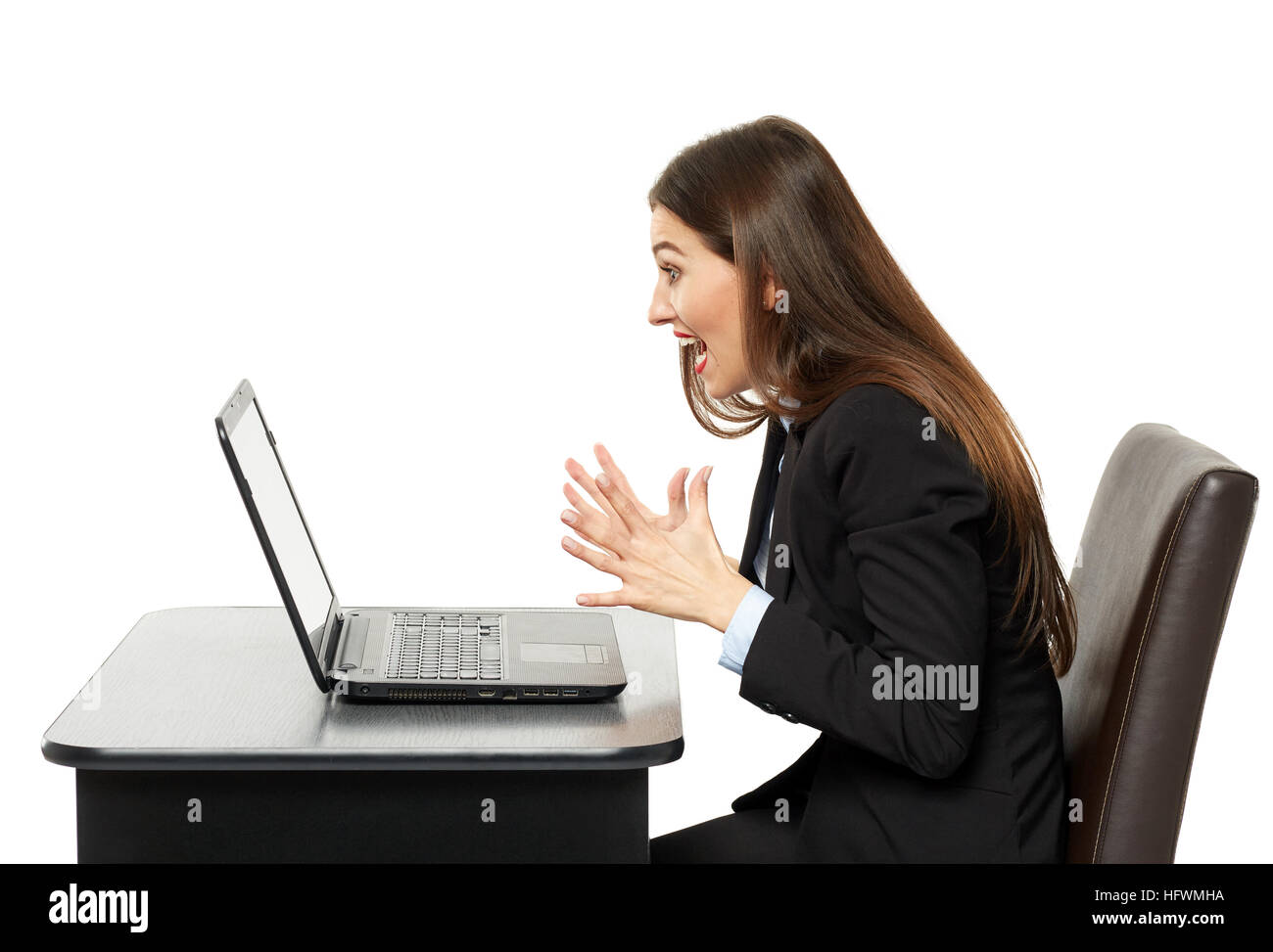 Frustrated and extremely angry business woman at her laptop Stock Photo ...