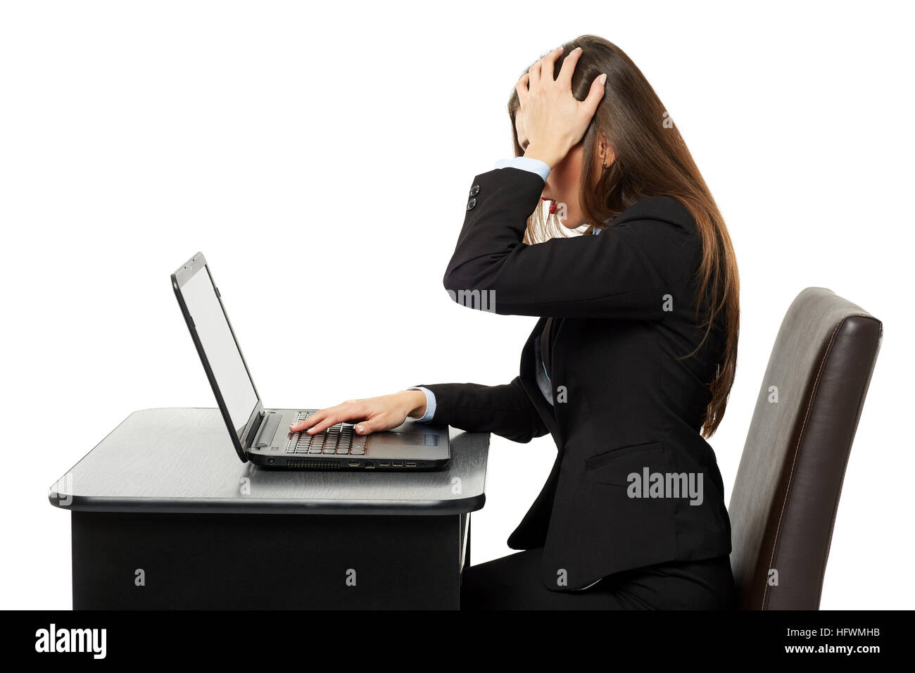Frustrated and extremely angry business woman at her laptop Stock Photo ...