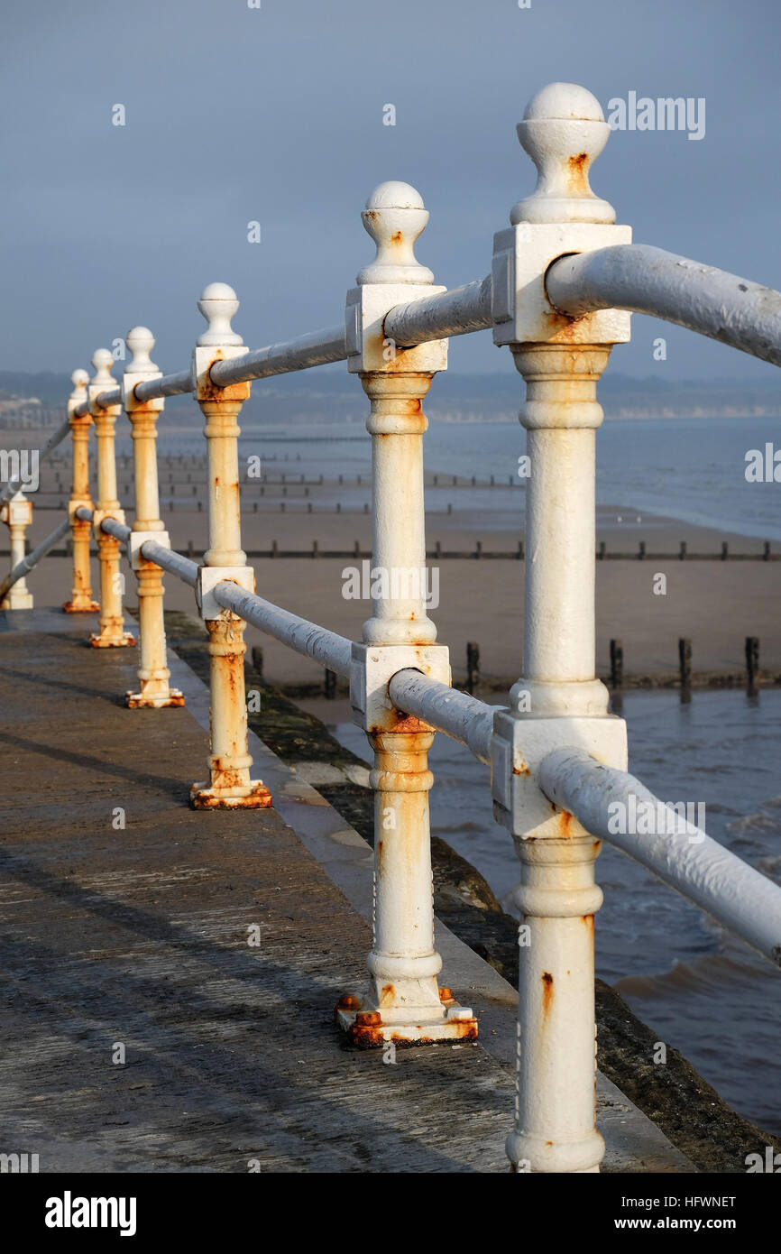 Corrosion on white painted cast iron railings at seaside resort Stock ...
