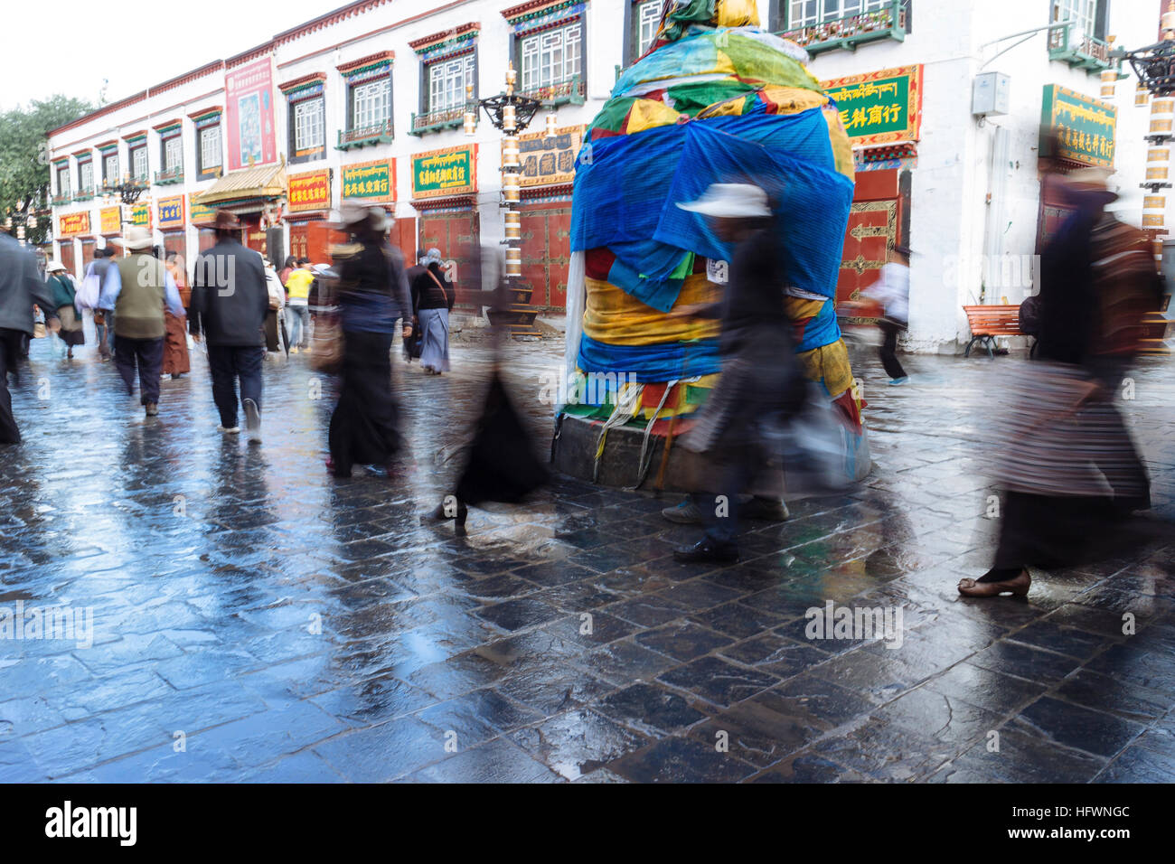 Lhasa, Tibet - The view of many Pilgrims at the Jokhang Temple Square ...