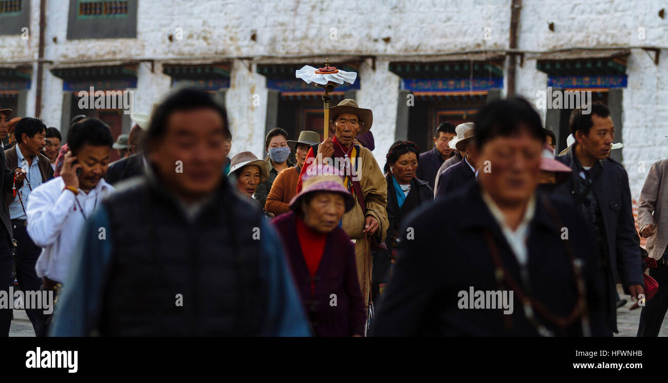 Lhasa, Tibet - The view of many Pilgrims at the Jokhang Temple Square ...