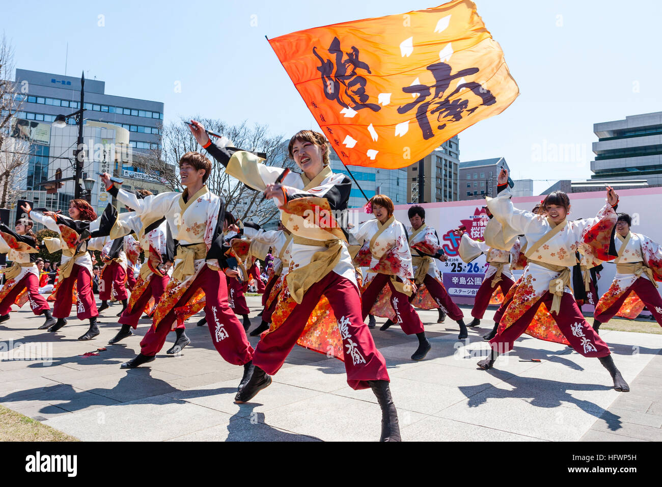 Japanese Yosakoi festival. University dance team dancing in city square ...