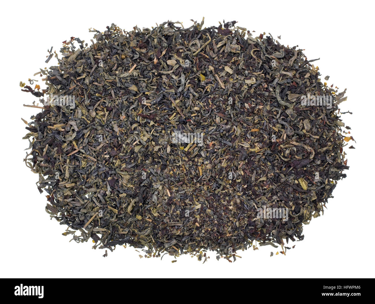Indian Ceylon tea heap lie on white table. Isolated top view studio ...