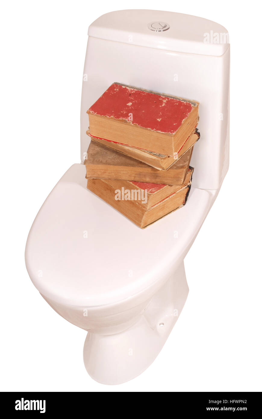 Old books on the lid of the toilet isolated with path Stock Photo - Alamy