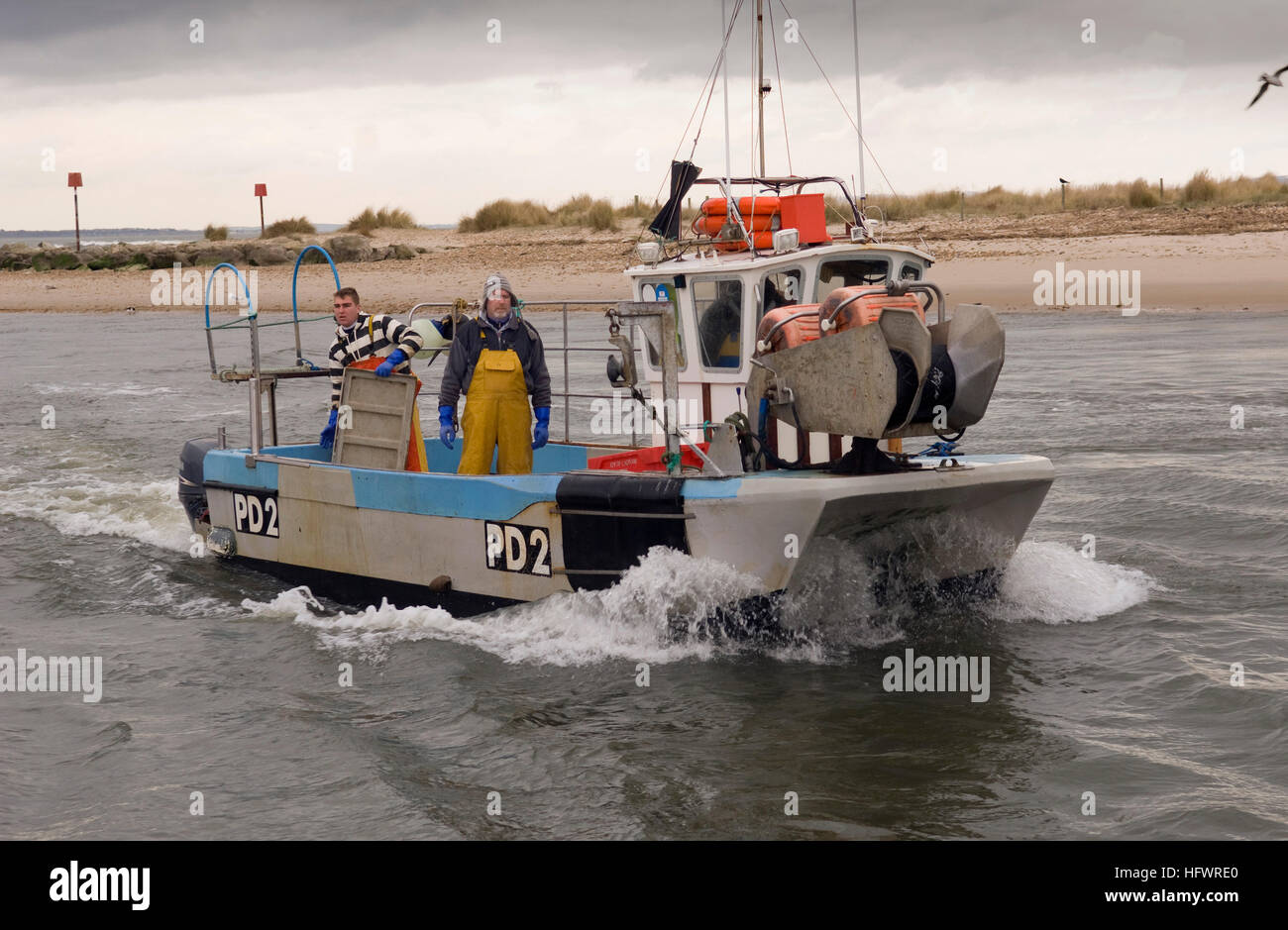 Crab fishing in Dorset with Les Lawrence (yellow wader) with fellow ...