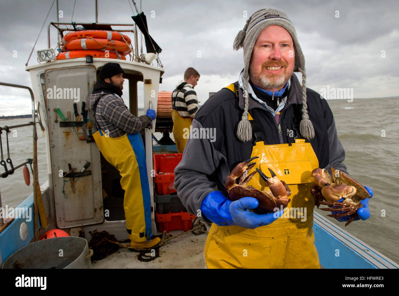 Crab fishing in Dorset with Les Lawrence (yellow wader) with fellow ...