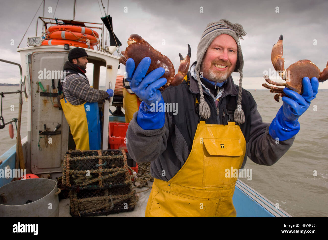 Crab fishing in Dorset with Les Lawrence (yellow wader) with fellow ...
