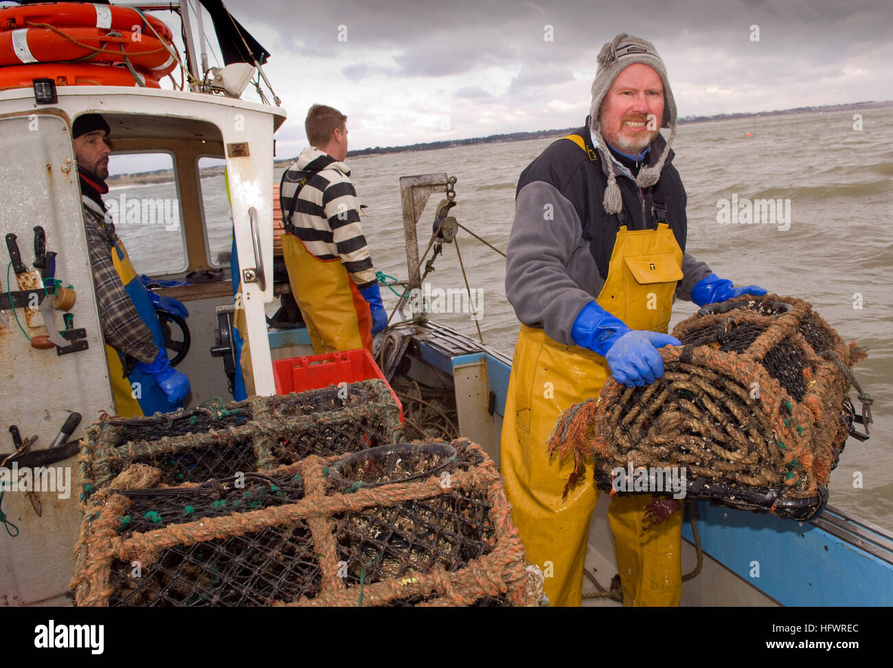 Crab fishing in Dorset with Les Lawrence (yellow wader) with fellow ...