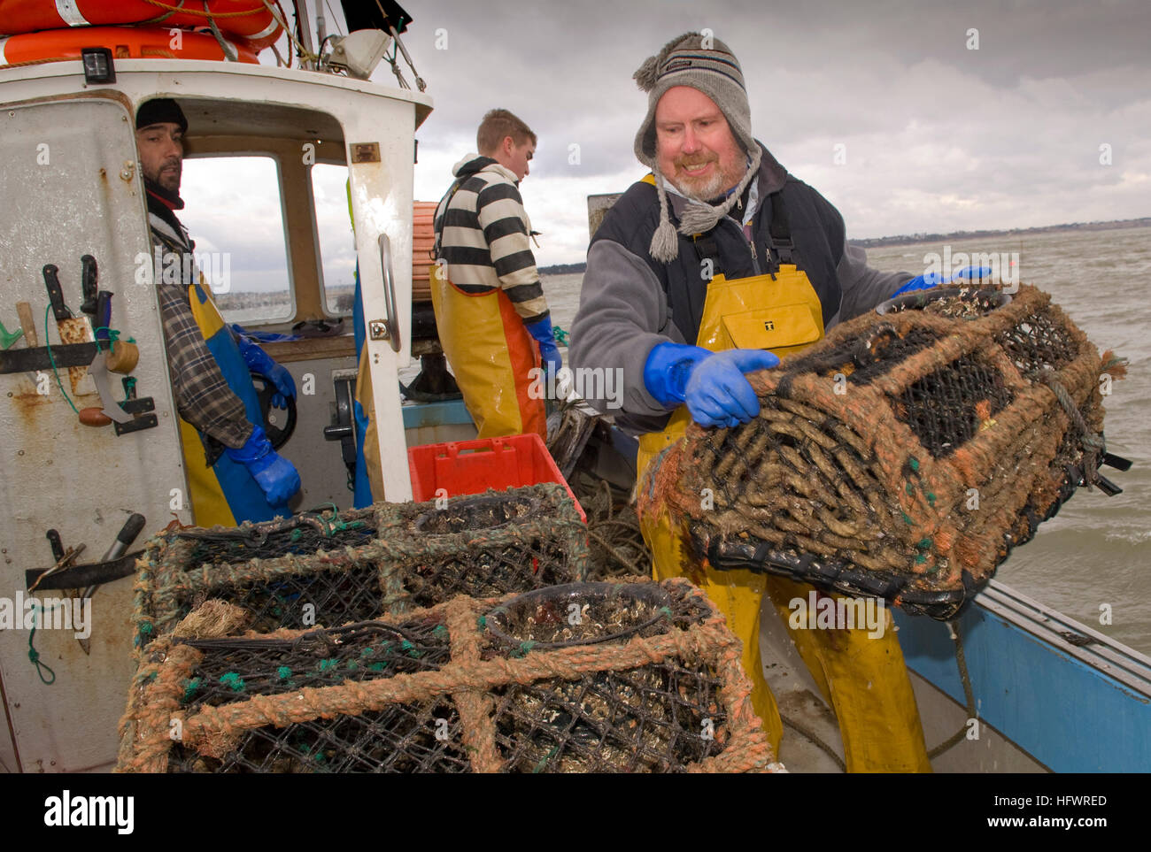 Crab fishing in Dorset with Les Lawrence (yellow wader) with fellow ...