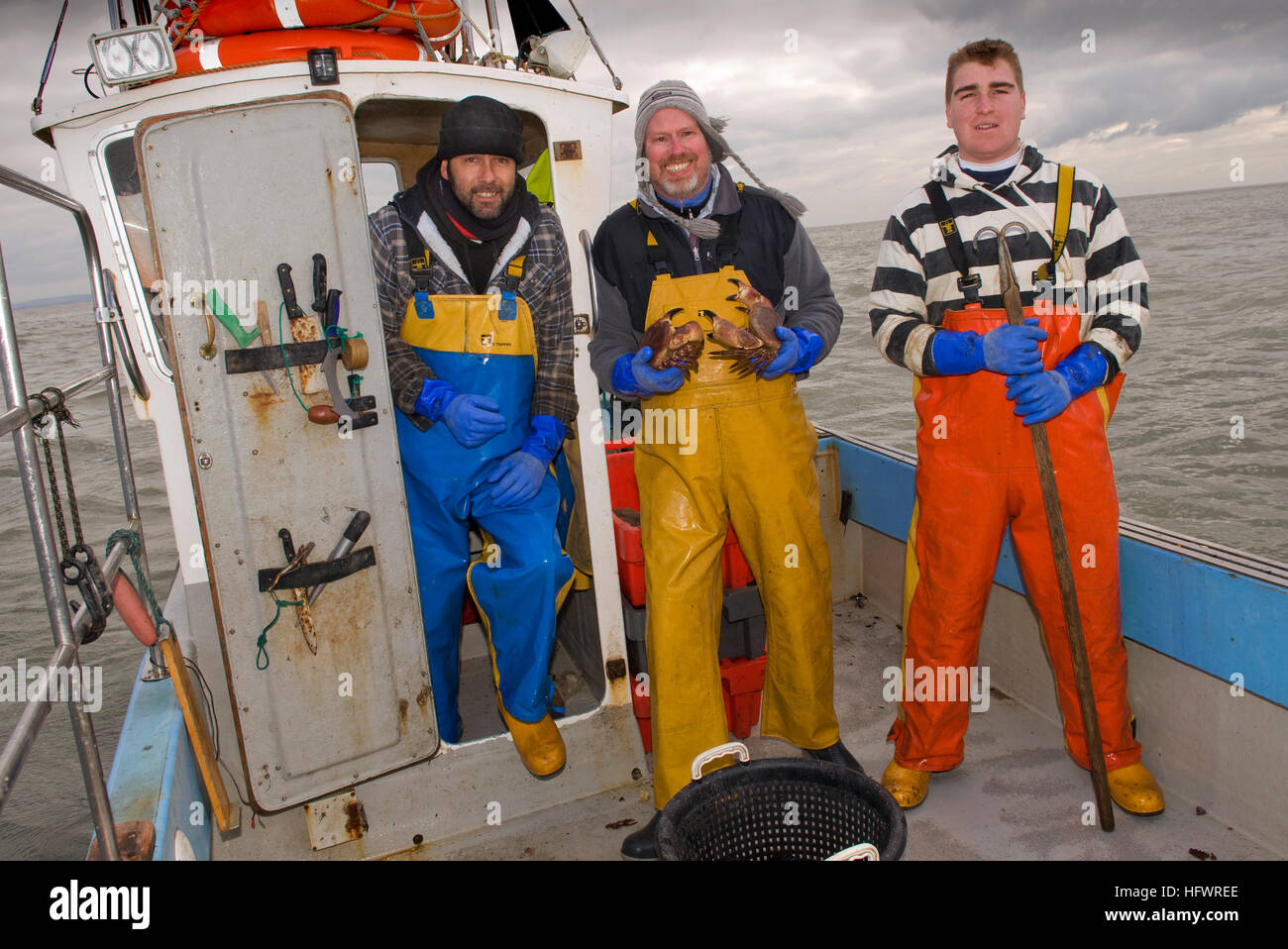 Crab fishing in Dorset with Les Lawrence (yellow wader) with fellow ...