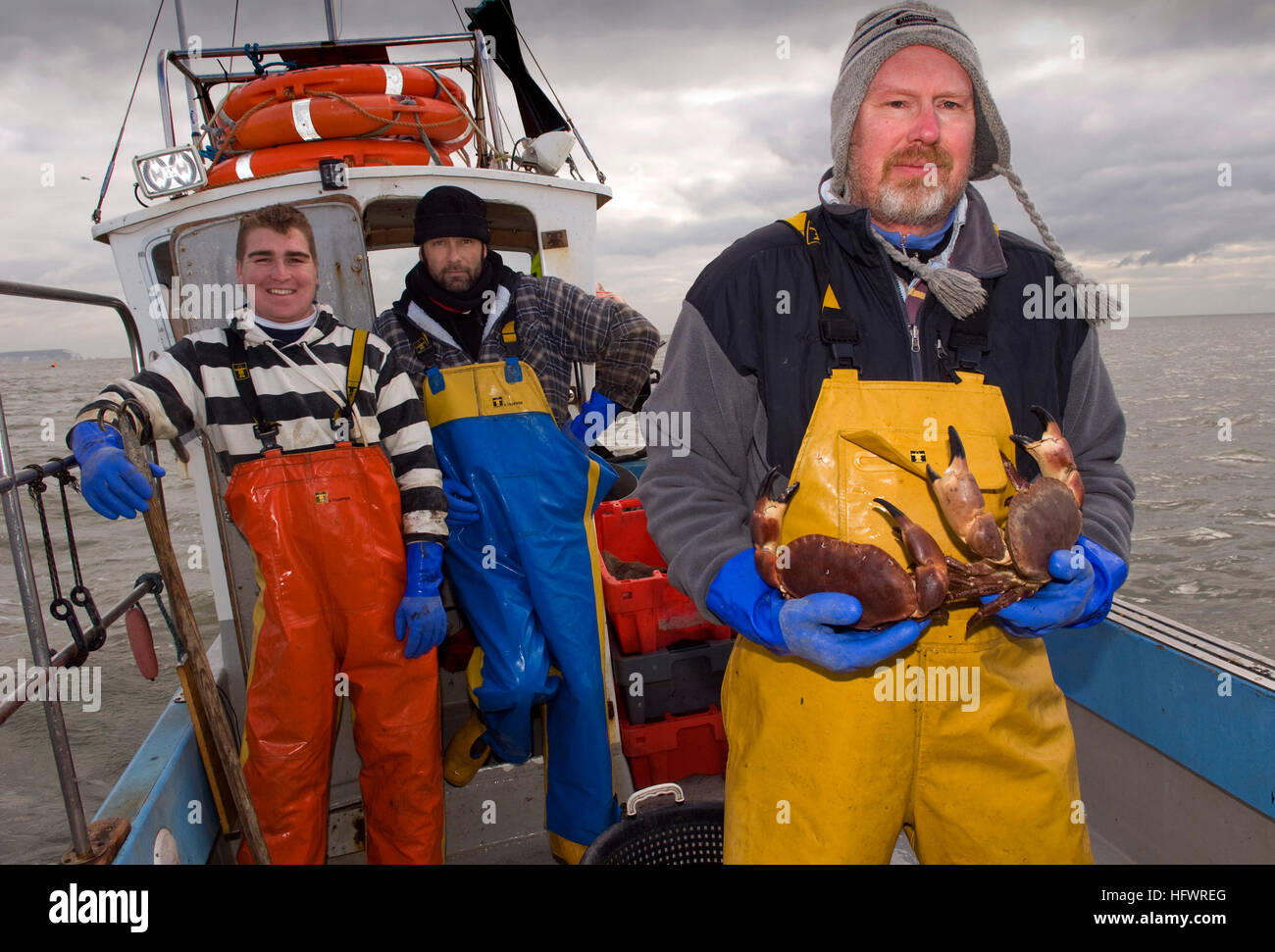Crab fishing in Dorset with Les Lawrence (yellow wader) with fellow ...
