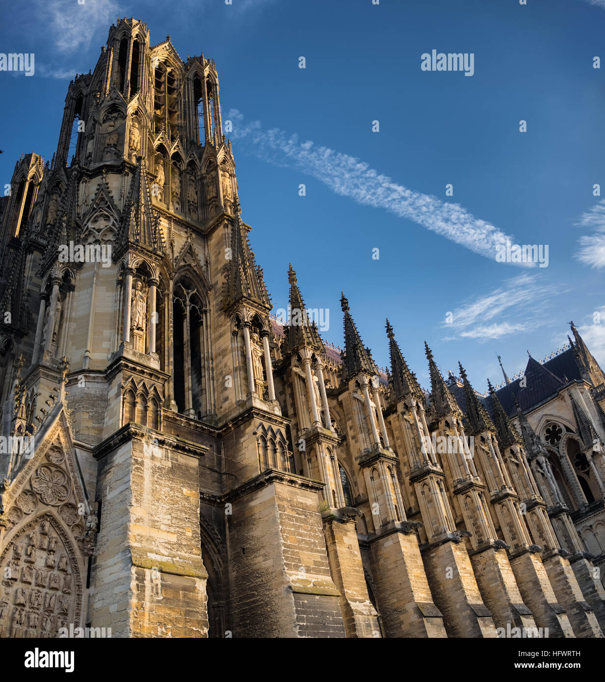 Reims cathedral in warm sunlight and beautiful blue sky, France Stock ...