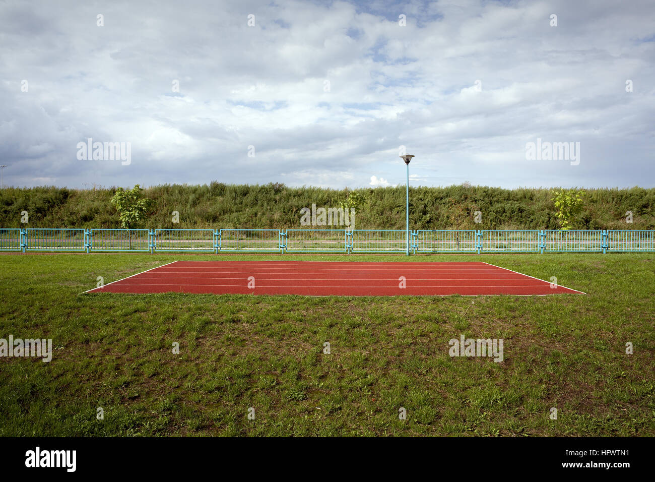 Mini red tartan track, running track Stock Photo - Alamy