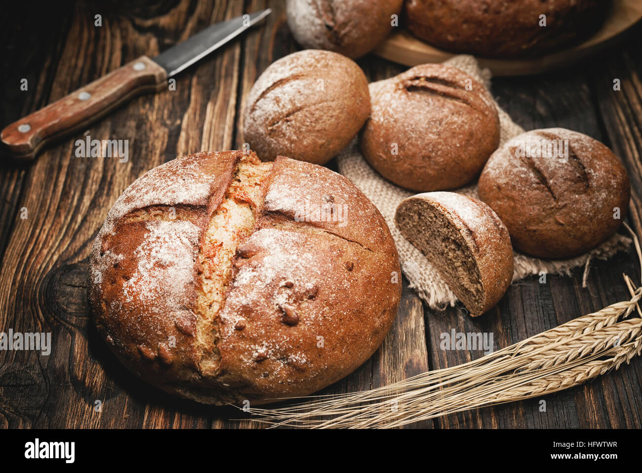 pieces of bread on a board with shallow depth of field Stock Photo - Alamy