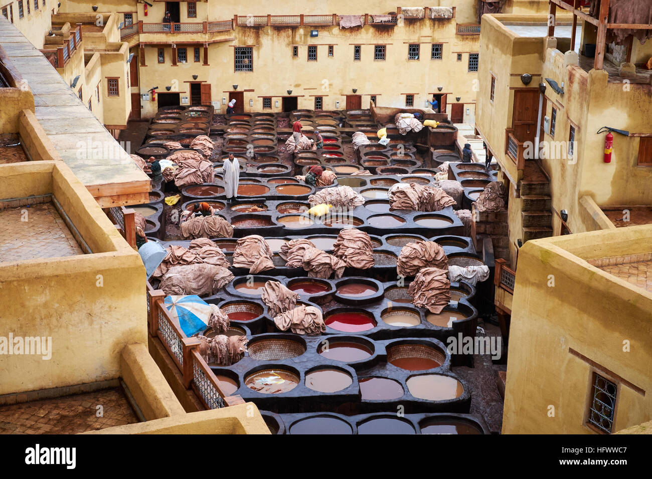 The Chouara tanneries in Fez medina, Morocco showing the dye pits and ...