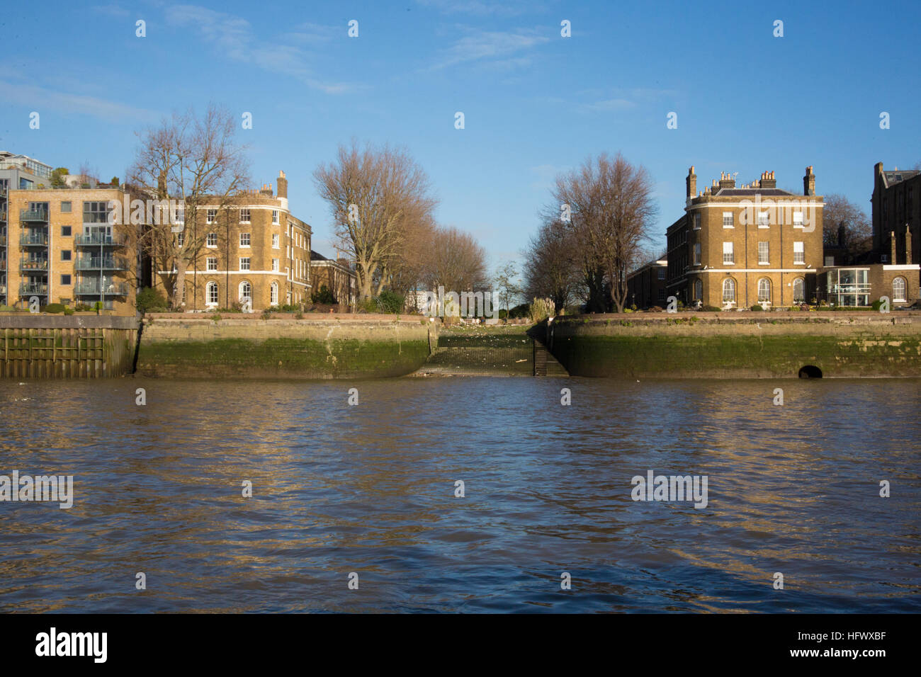 Houses on the banks of the River Thames in East London Stock Photo - Alamy
