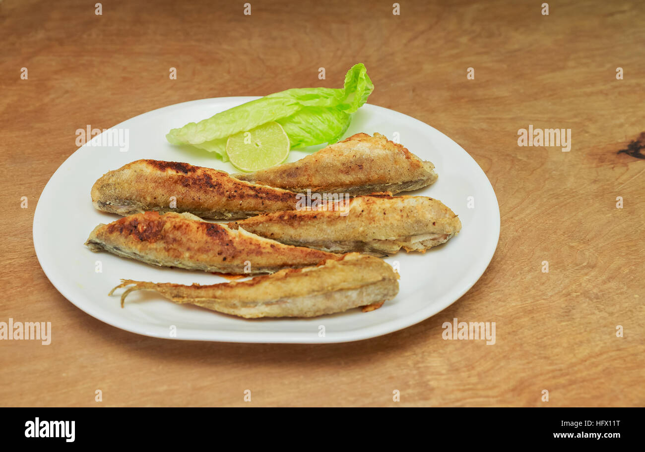 delicious crispy fried capelin fish and chips with garlic sauce Stock ...