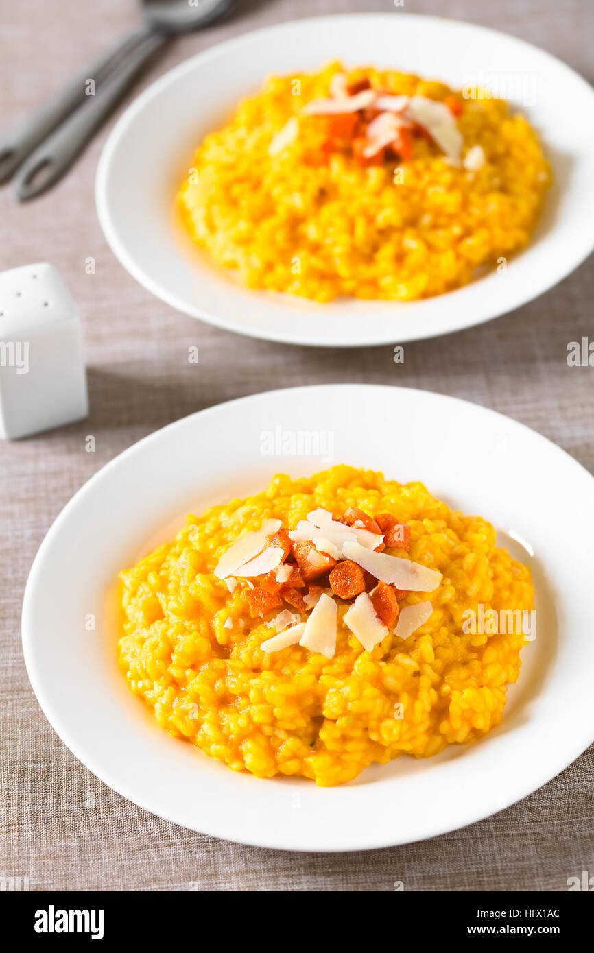 Fresh homemade carrot risotto made with pureed carrot, garnished with ...