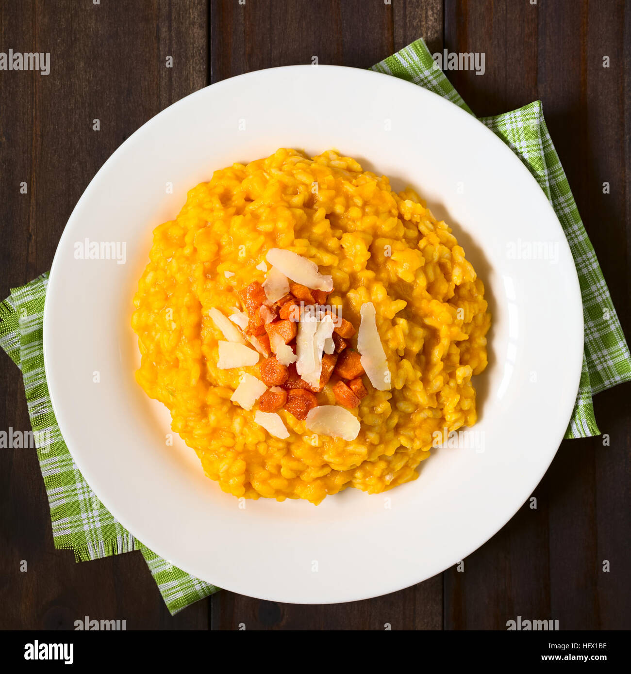 Fresh homemade carrot risotto made with pureed carrot, garnished with ...