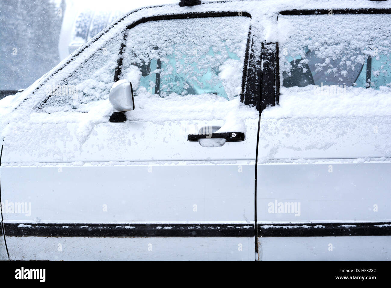 Old white car covered by snow in wintertime Stock Photo - Alamy