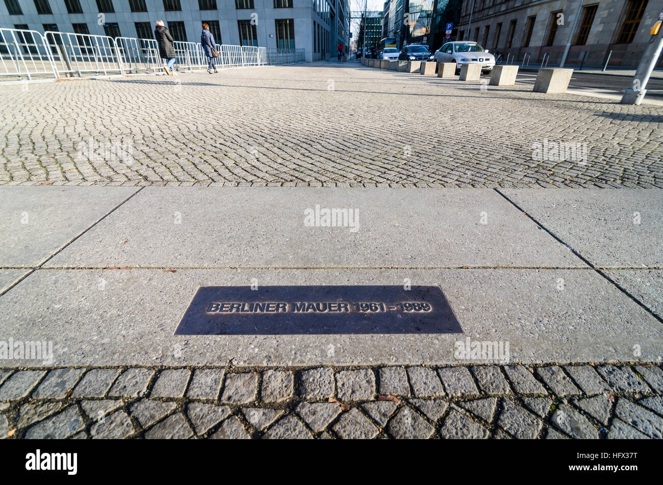 Historic route of the Berlin Wall Berliner Mauer marked by a sign on ...