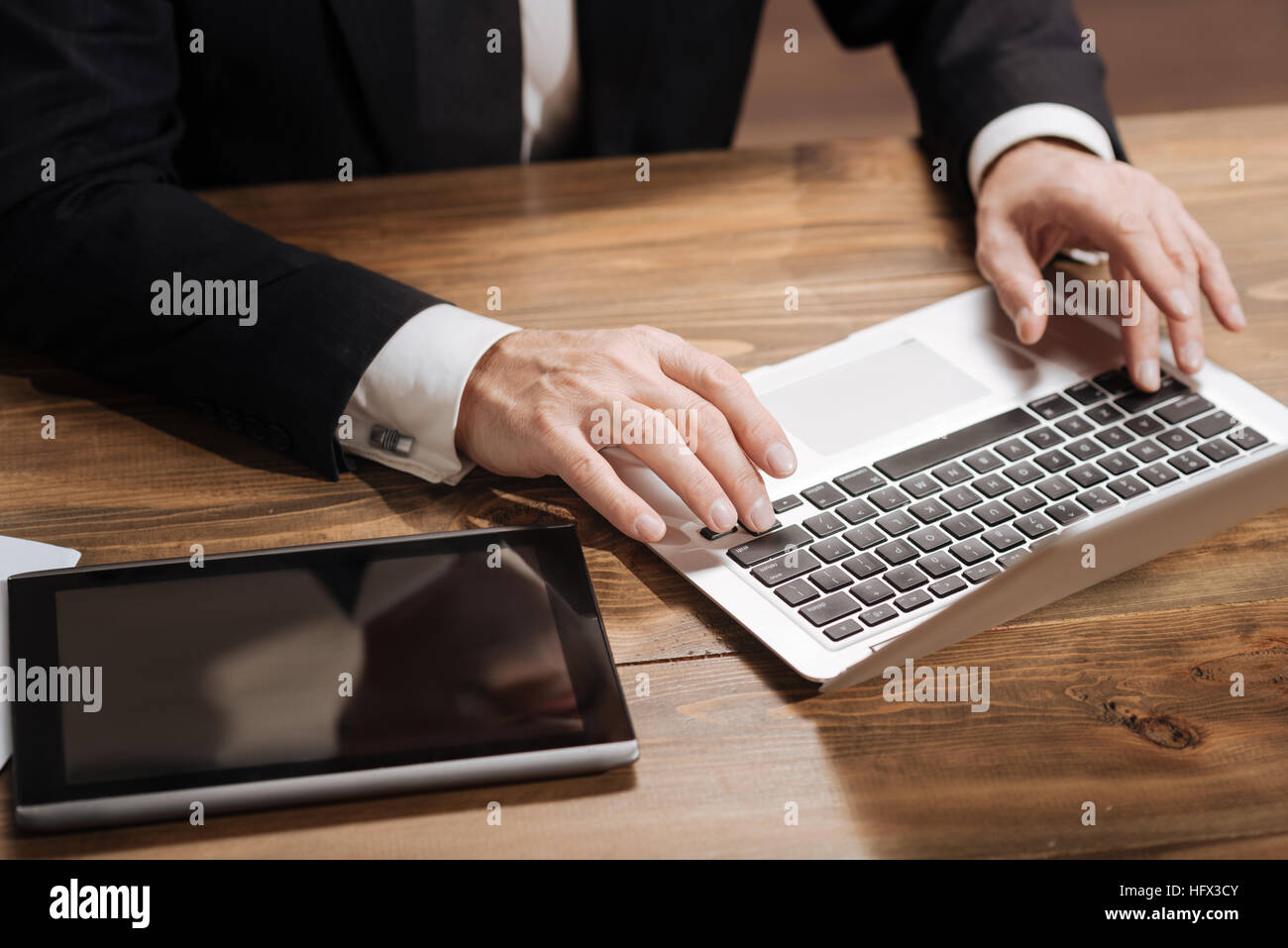 Stylish man typing a letter Stock Photo - Alamy