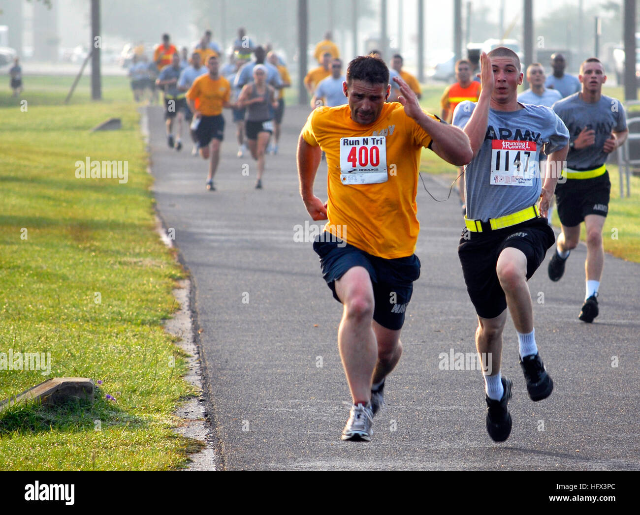 100519-N-7367K-001 GULFPORT, Miss. (May 19, 2010) A Sailor and a ...