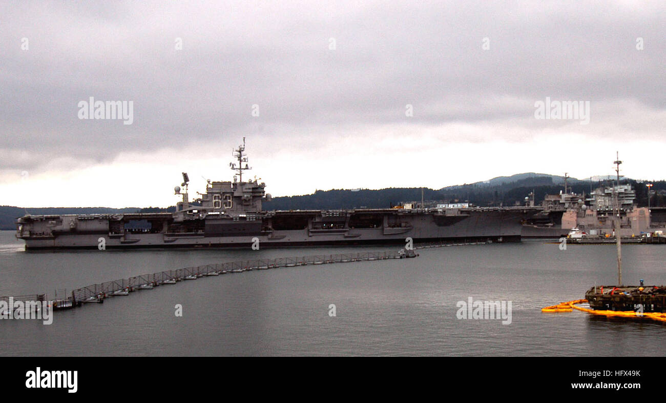 The aircraft carrier USS Kitty Hawk (CV 63) changes berth at Puget ...