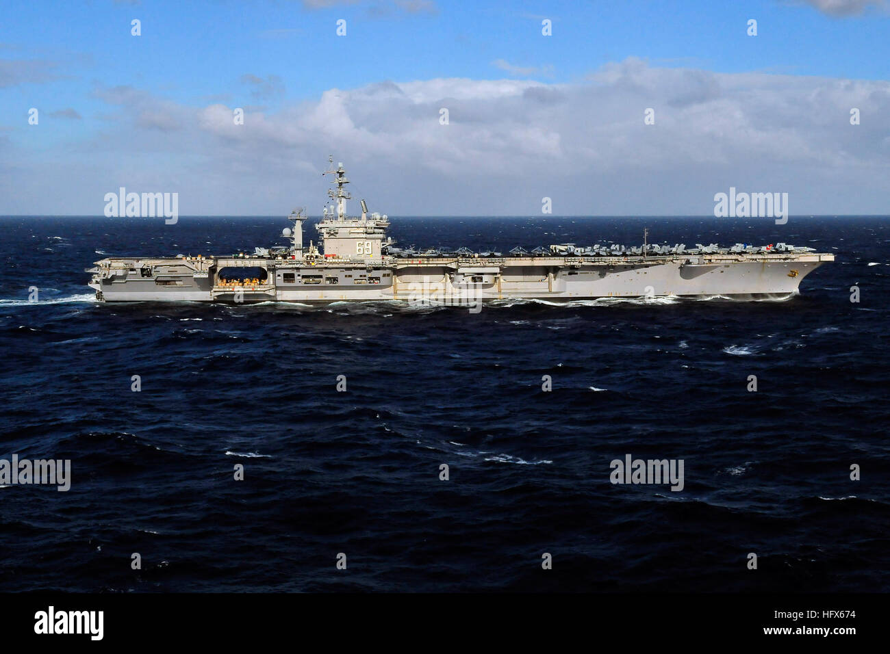 The aircraft carrier USS Dwight D. Eisenhower (CVN 69) transits the ...