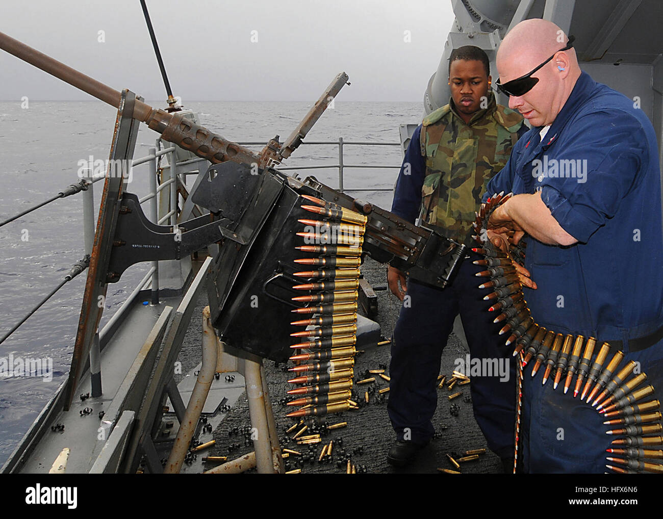 Navy loads 50 caliber machine gun hi-res stock photography and images ...