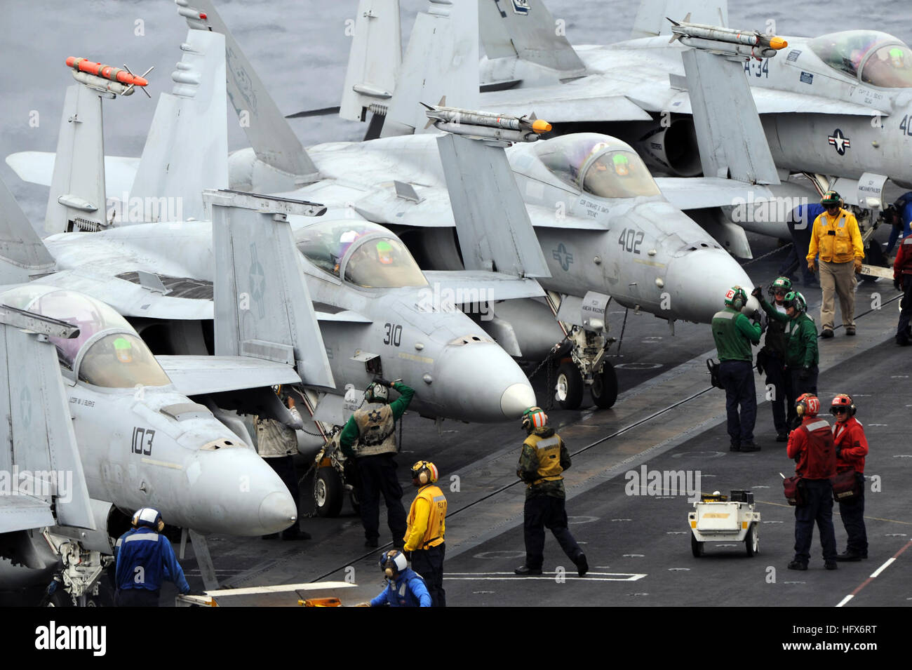 111005-N-BH789-116 PACIFIC OCEAN (Oct. 5, 2011) Sailors perform final ...