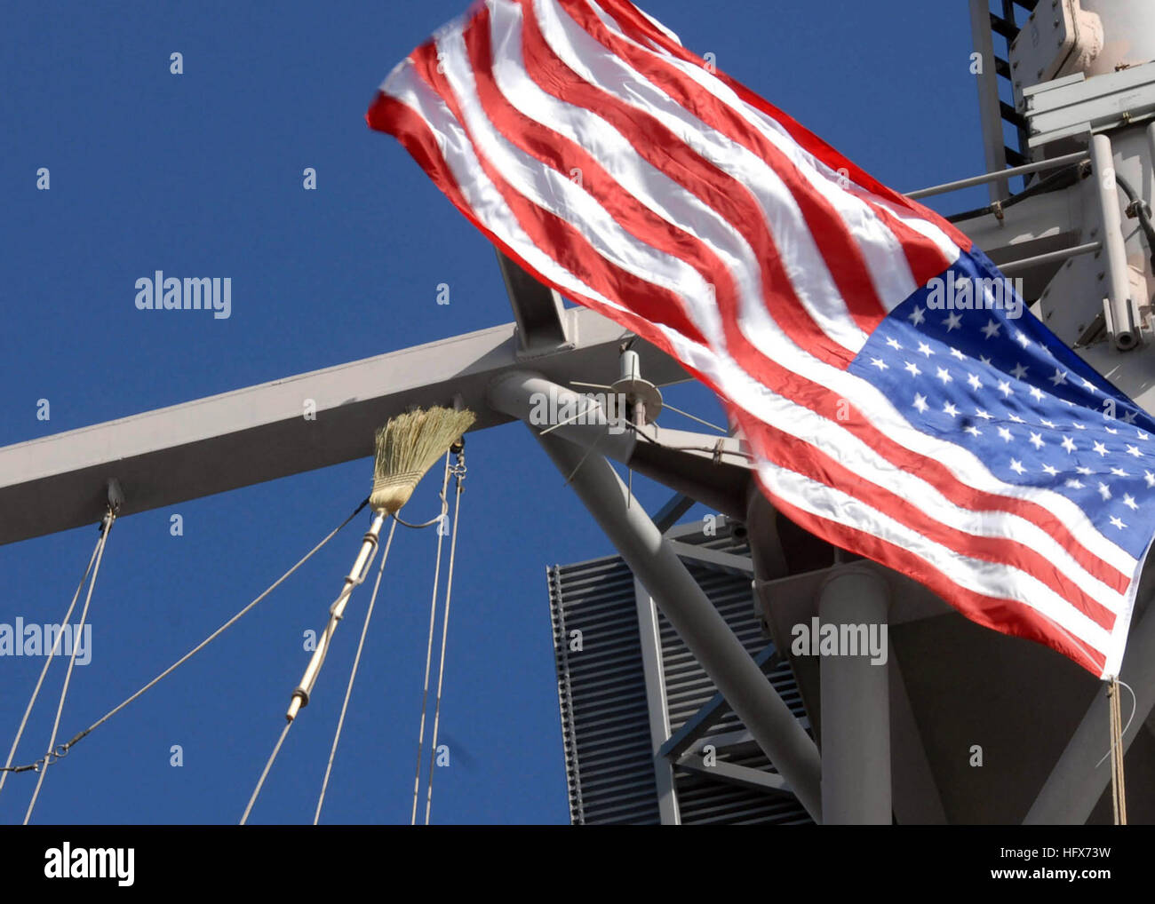 090326-N-0515W-059 SAN DIEGO (March 26, 2009) A broom is hoisted to the ...