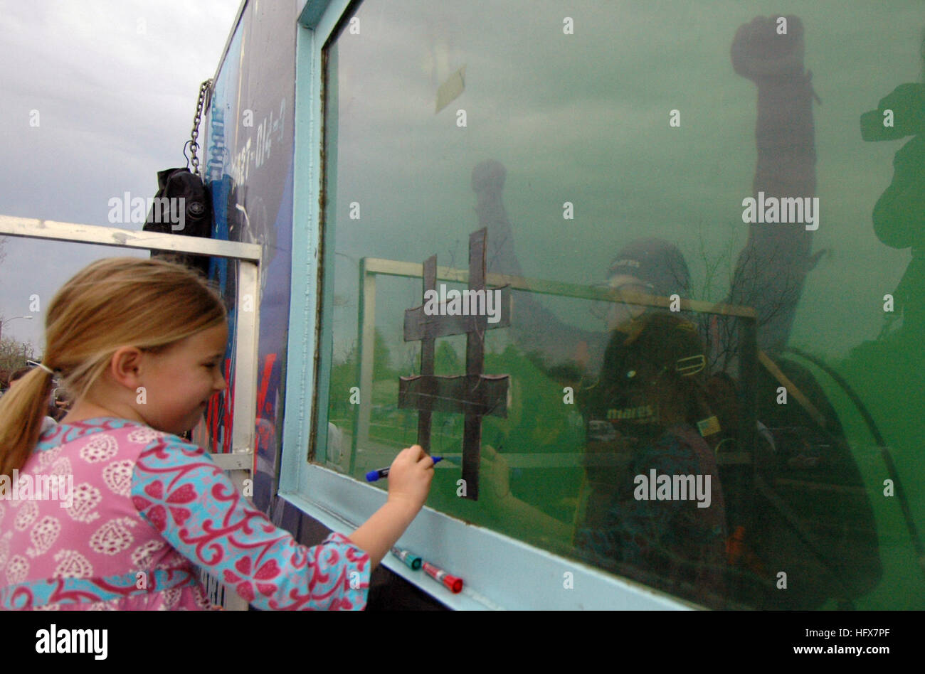 During St. Louis Navy Week, a Navy diver engages with the public in a ...