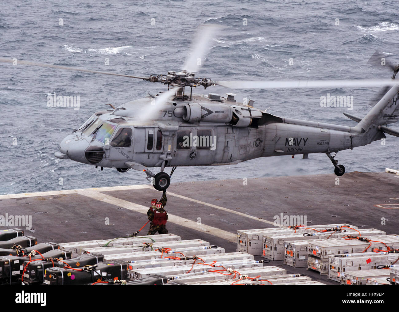 090519-N-2562S-004 ATLANTIC OCEAN (May 19, 2009) Sailors attach ...