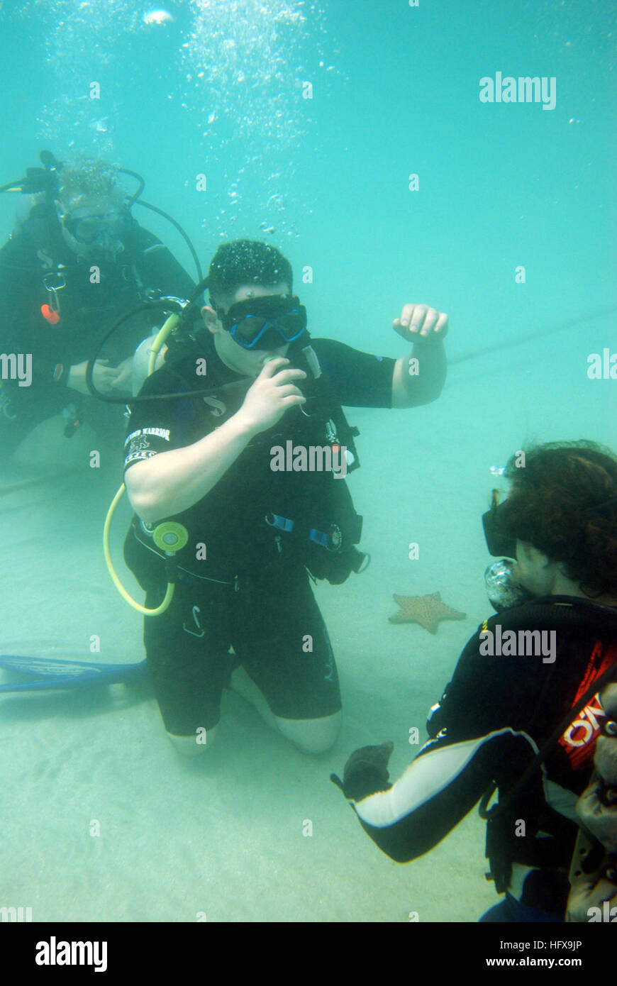 GUANTANAMO BAY, Cuba – Wounded warrior Lance Cpl. Robert Smith receives ...