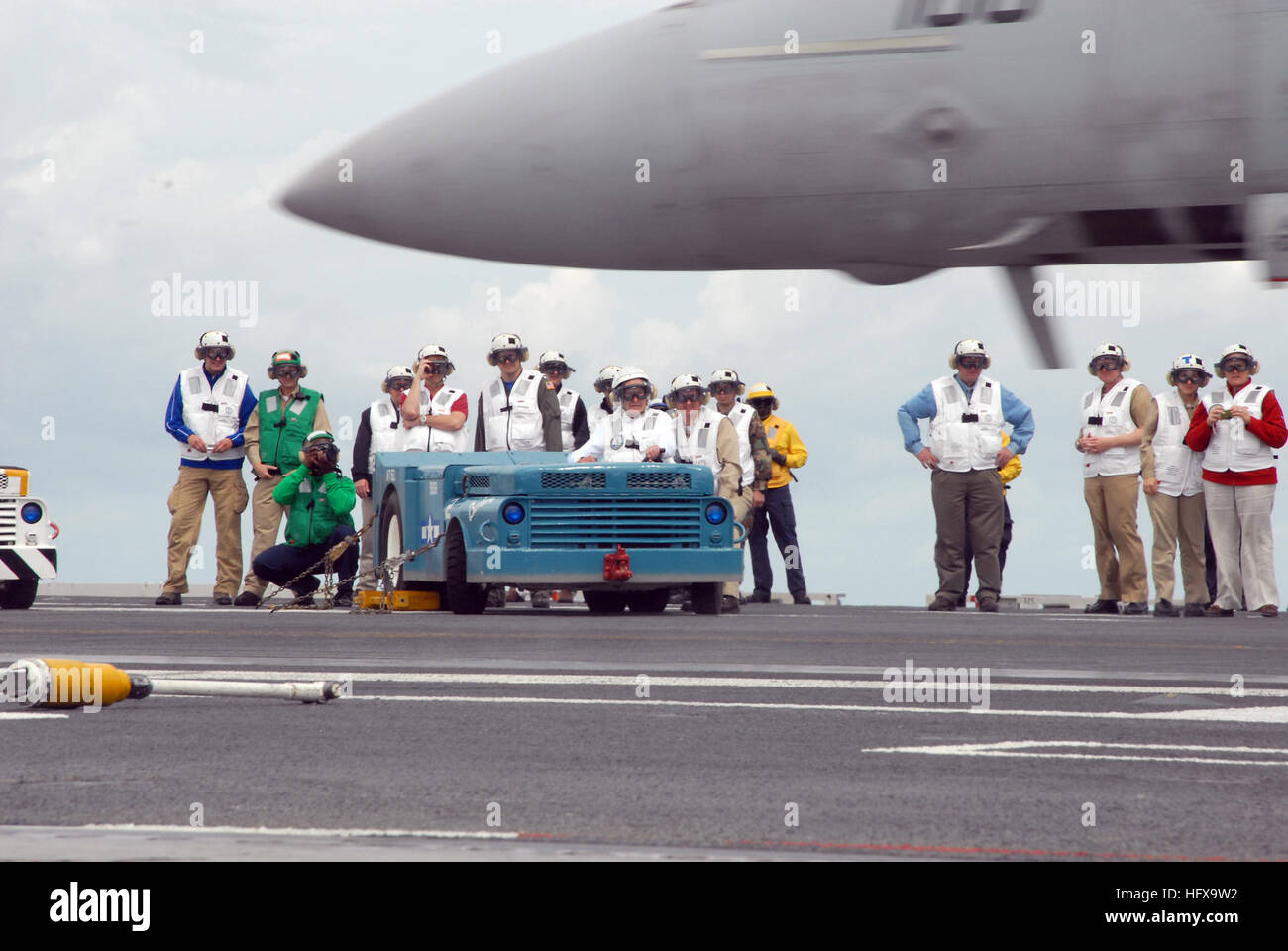 Us navy flight deck tractor hi-res stock photography and images - Alamy