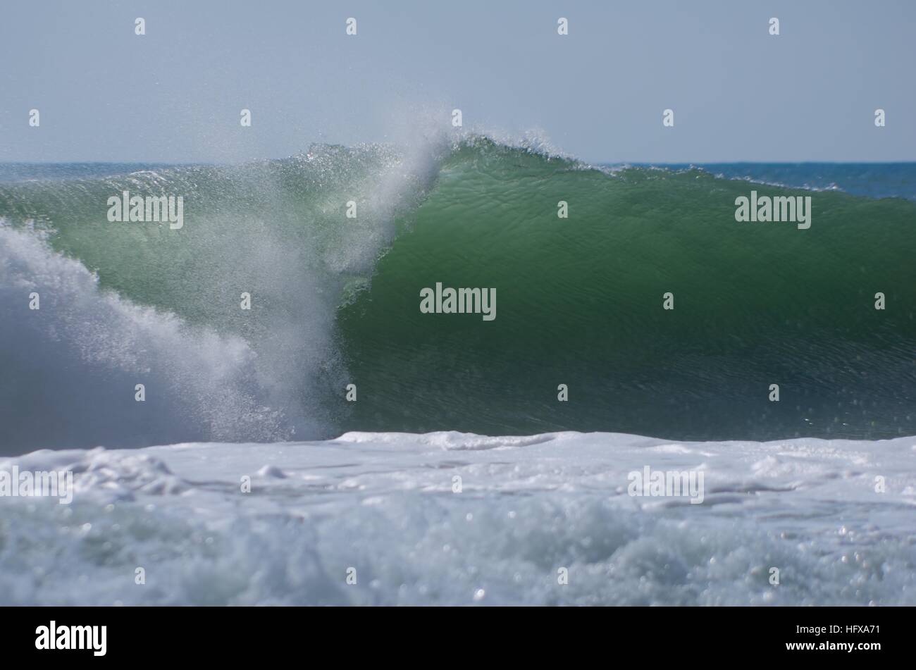 Large wave breaking Stock Photo - Alamy