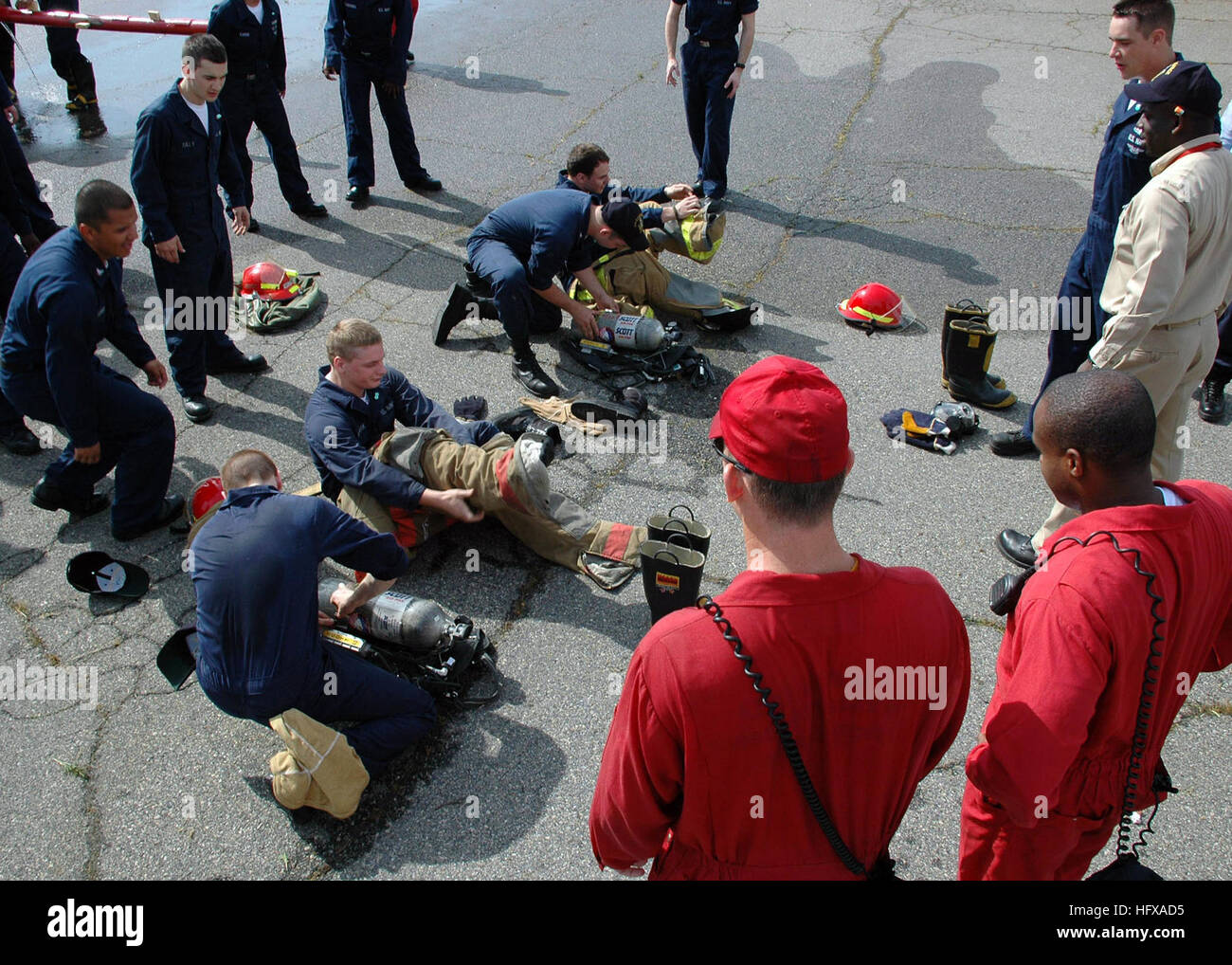 Damage control firefighting sailors hi-res stock photography and images ...